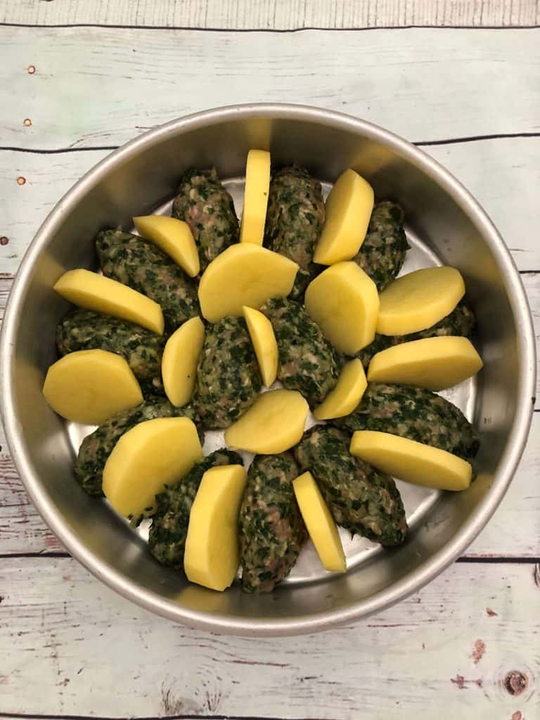 Kiftah bi Tahini Sauce Meatballs - Palestine In A Dish